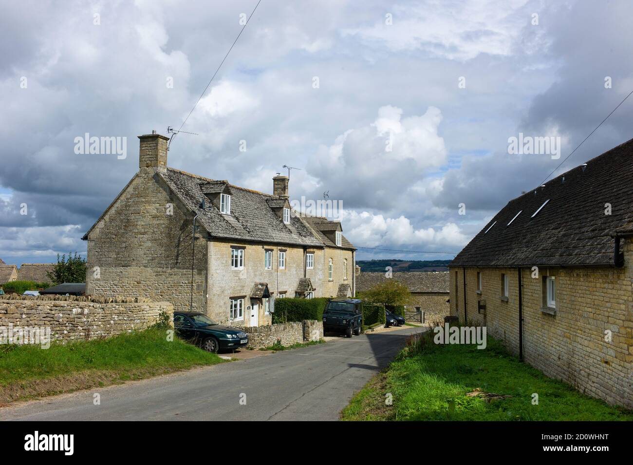 View at the charming Cotswold stone cottages in the small village ...