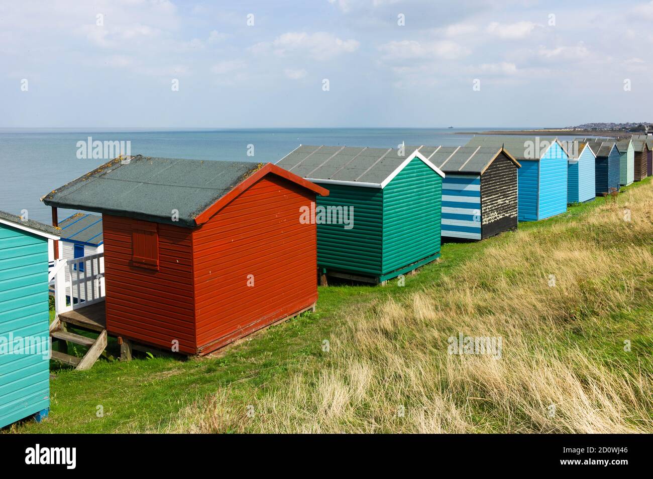 Traditional colorful English beach huts in Whitstable, Kent in the ...