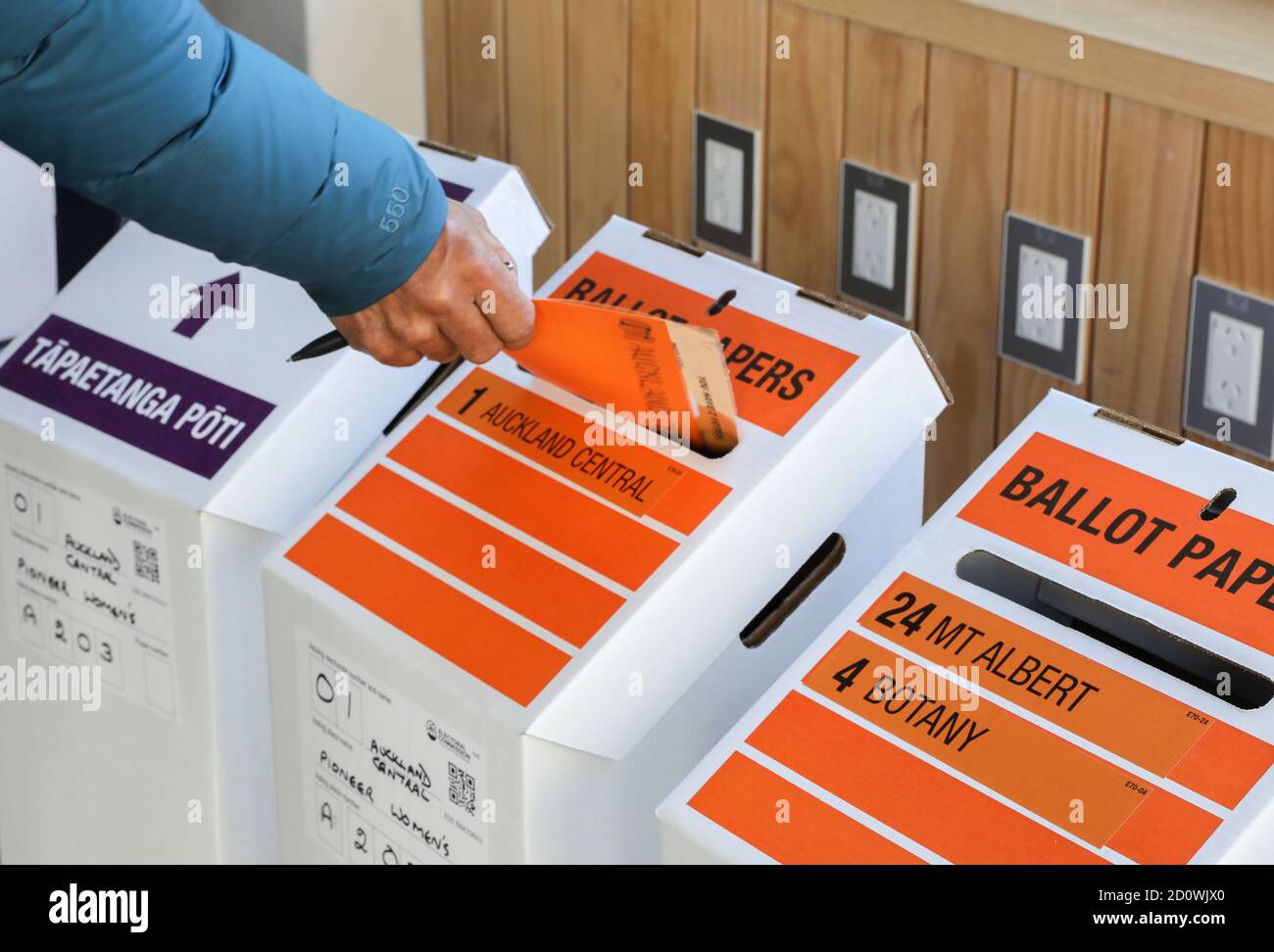 Auckland, New Zealand. 3rd Oct, 2020. A man casts his ballots for the ...
