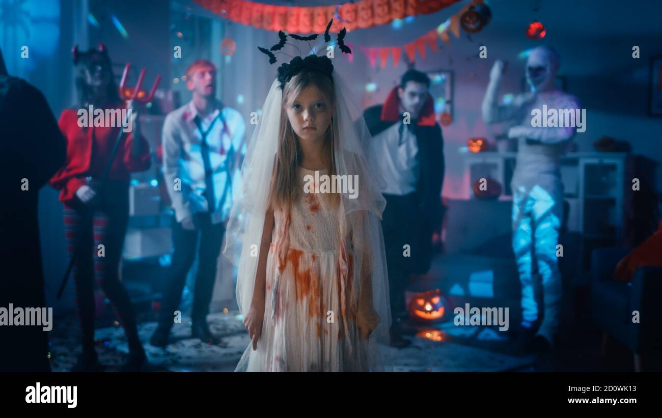 Halloween Costume Party: Little Girl in a Bloody White Bride Dress ...