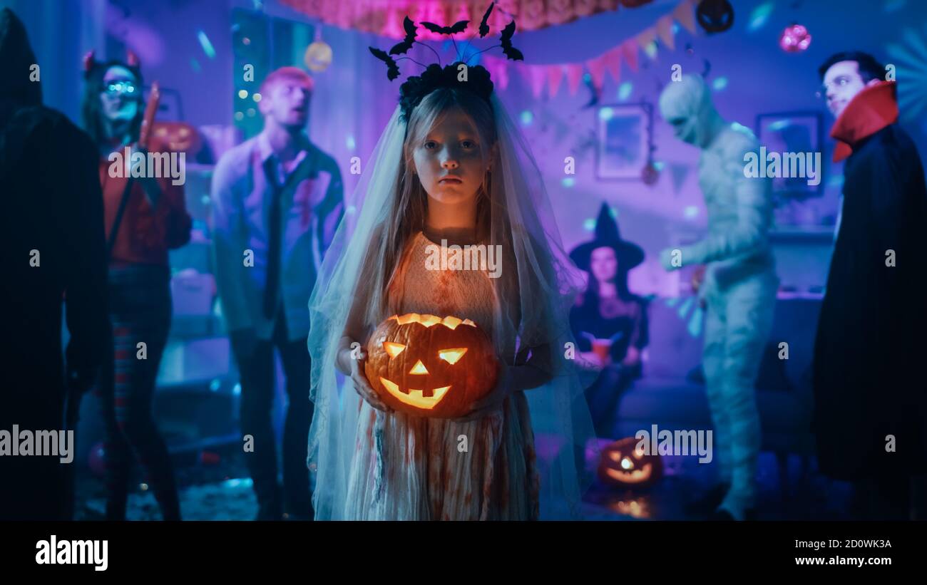 Halloween Costume Party: Little Girl in a Bloody White Bride Dress ...