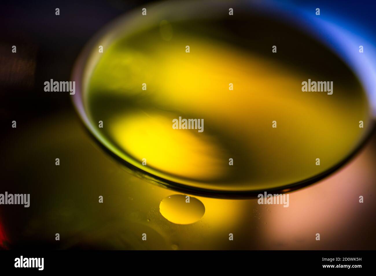 Oil drops in the water create an artistic and imaginatively designed ...