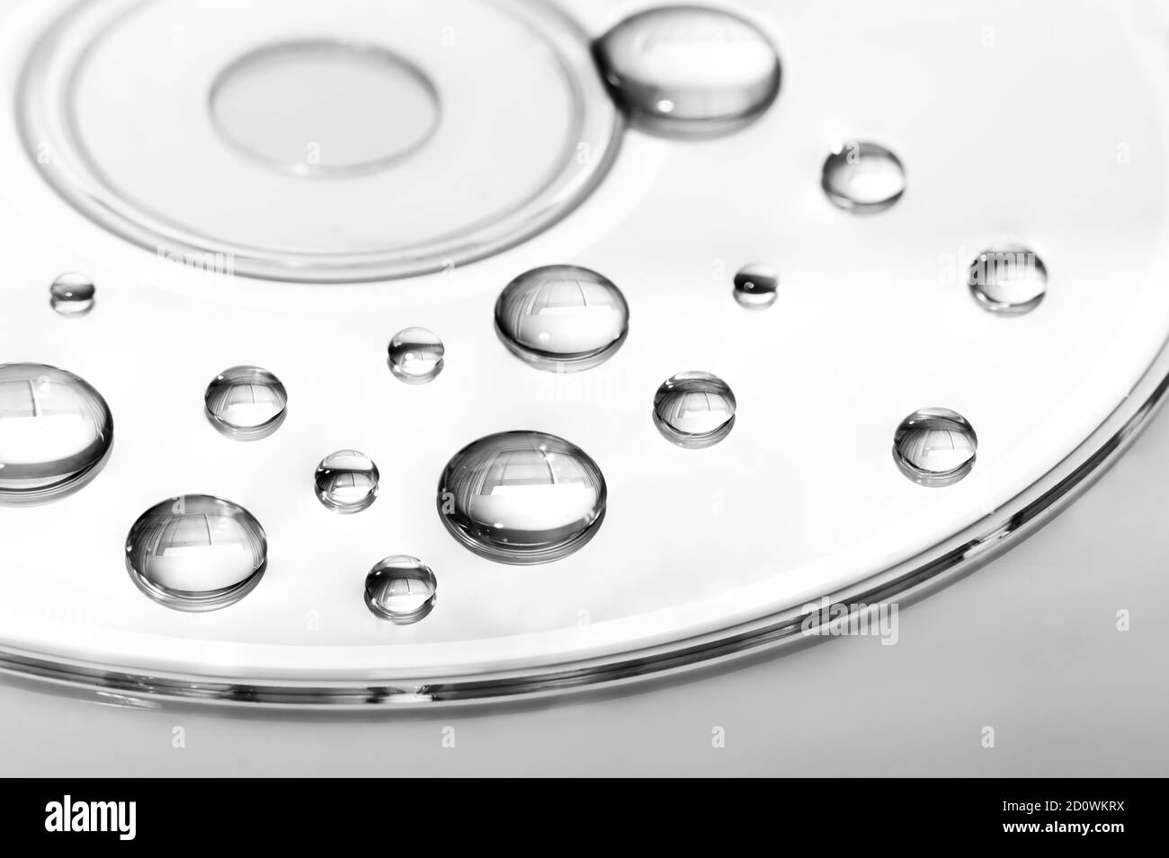 CD with water droplets on it - closeup with selective focus, futuristic ...