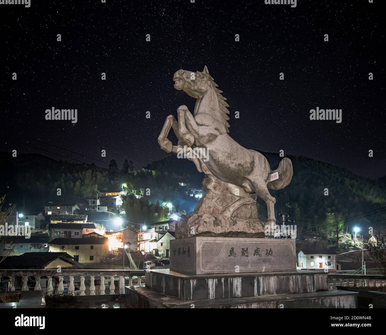 Stone statue at night with stars in the background Stock Photo - Alamy