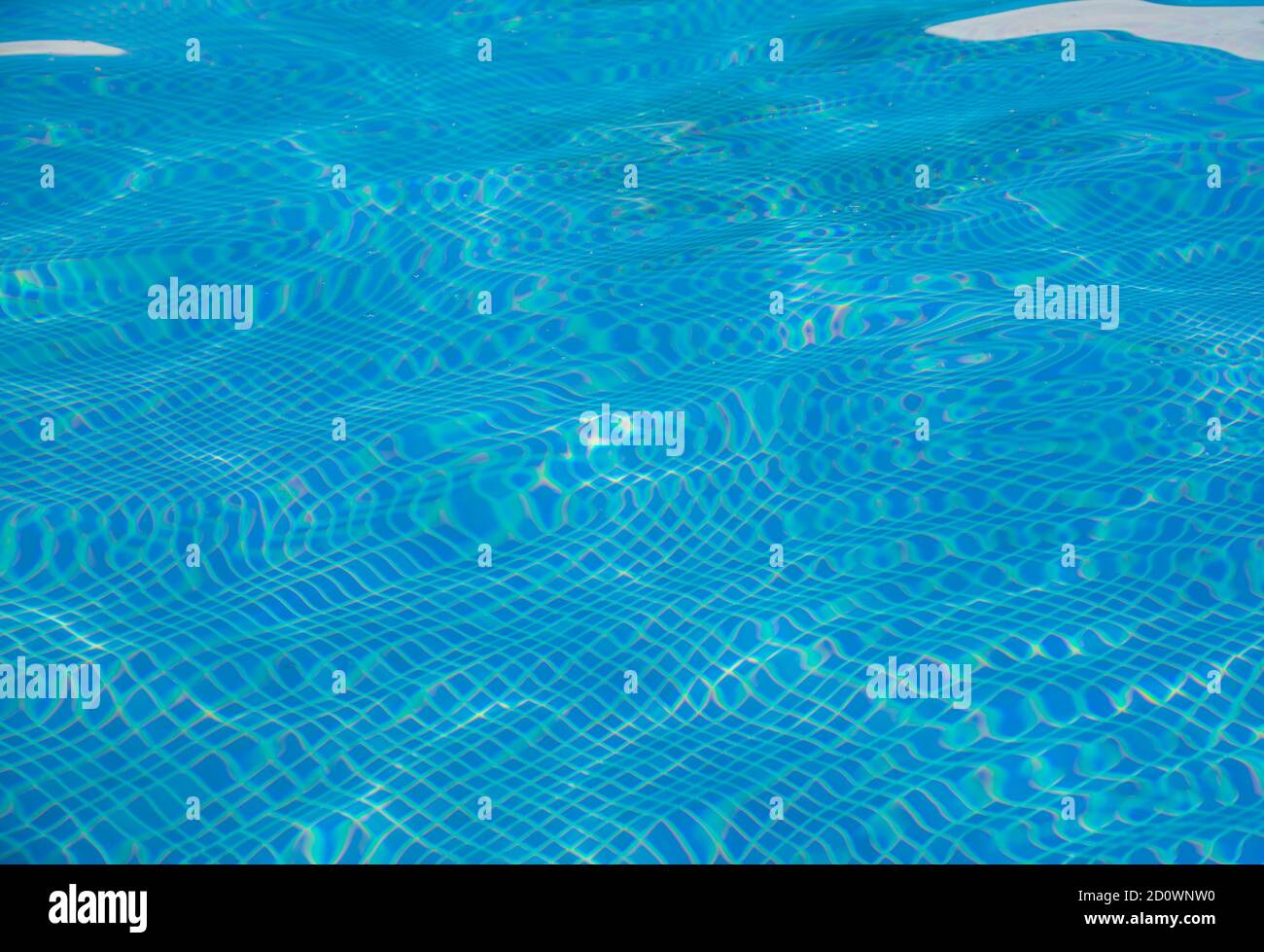 Blue water in swimming pool Stock Photo - Alamy