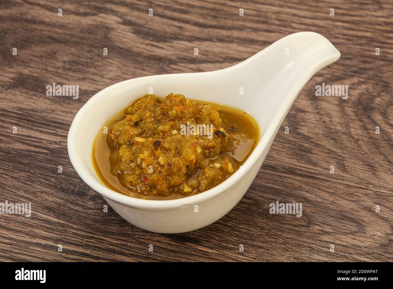 Green spicy sauce with pepper in the bowl Stock Photo - Alamy
