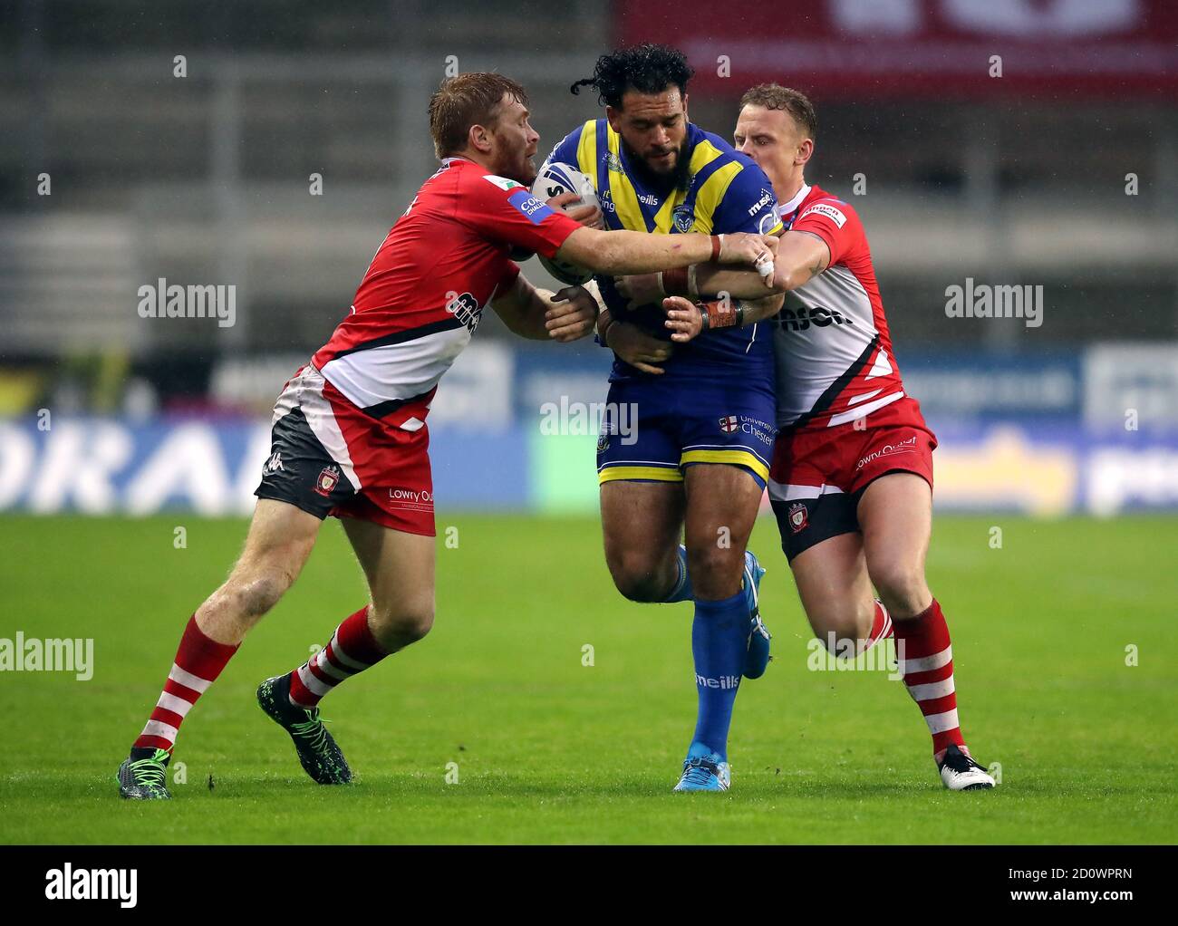 Warrington Wolves' Ben Murdock-Masila tackled by Salford Red Devils ...