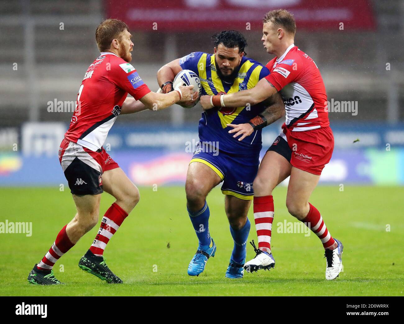 Warrington Wolves' Ben Murdock-Masila tackled by Salford Red Devils ...