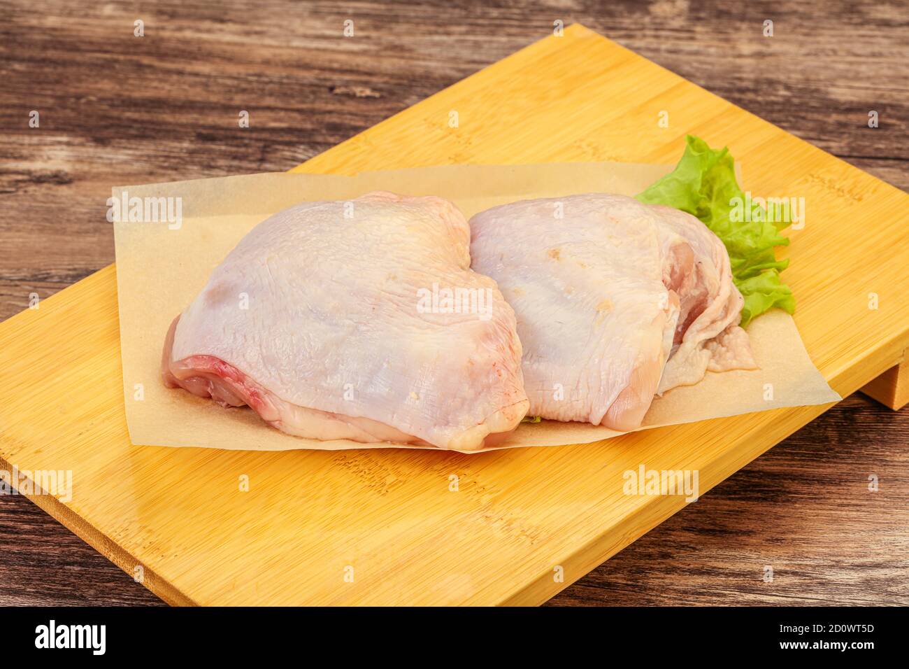 Raw chicken hip ready for cooking Stock Photo - Alamy