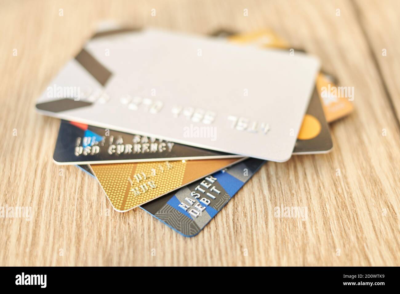 Bank cards on table hi-res stock photography and images - Alamy