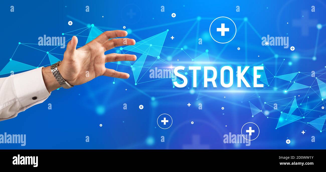 Close-Up of cropped hand pointing at STROKE inscription, medical ...