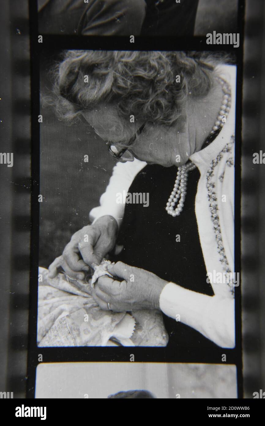 Fine 1970s vintage black and white photography of an elderly lady doing ...