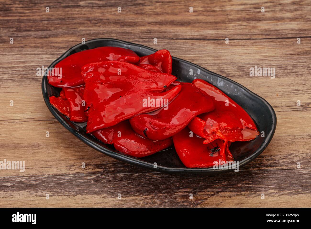 Grilled red pepper in the oil Stock Photo - Alamy