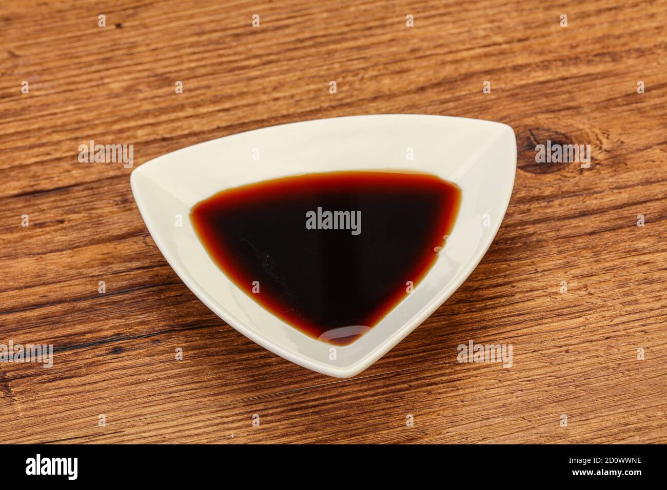 Asian cuisine - soya sauce in the bowl Stock Photo - Alamy