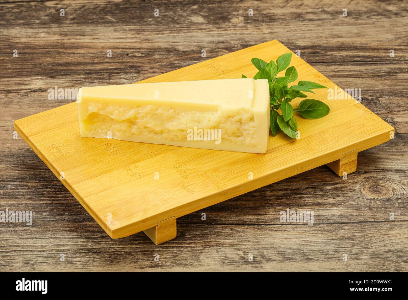 Hard parmesan cheese served basil leaves Stock Photo - Alamy
