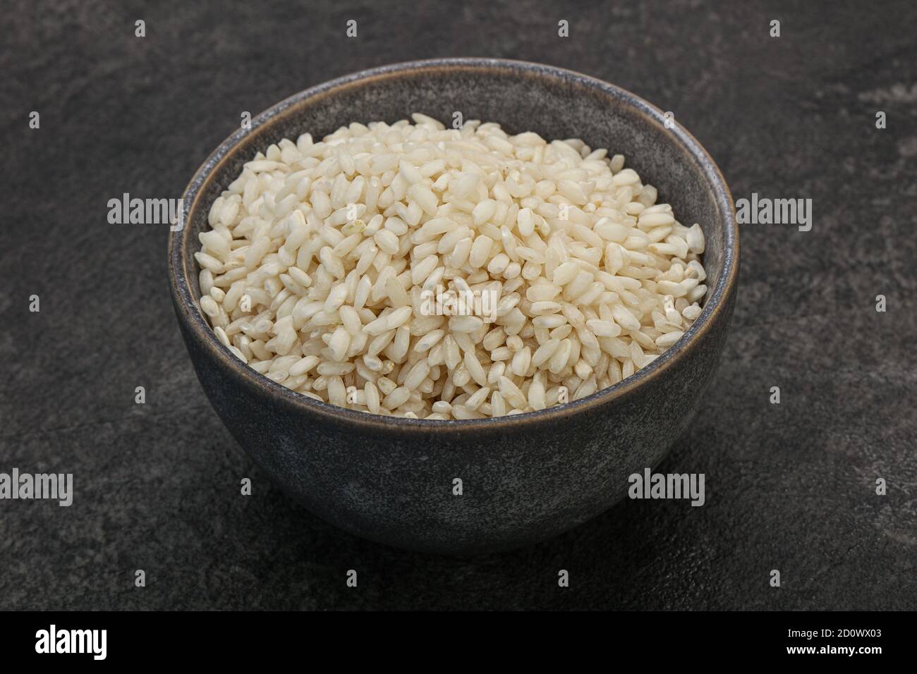 Raw Italian arborio rice for Risotto Stock Photo - Alamy