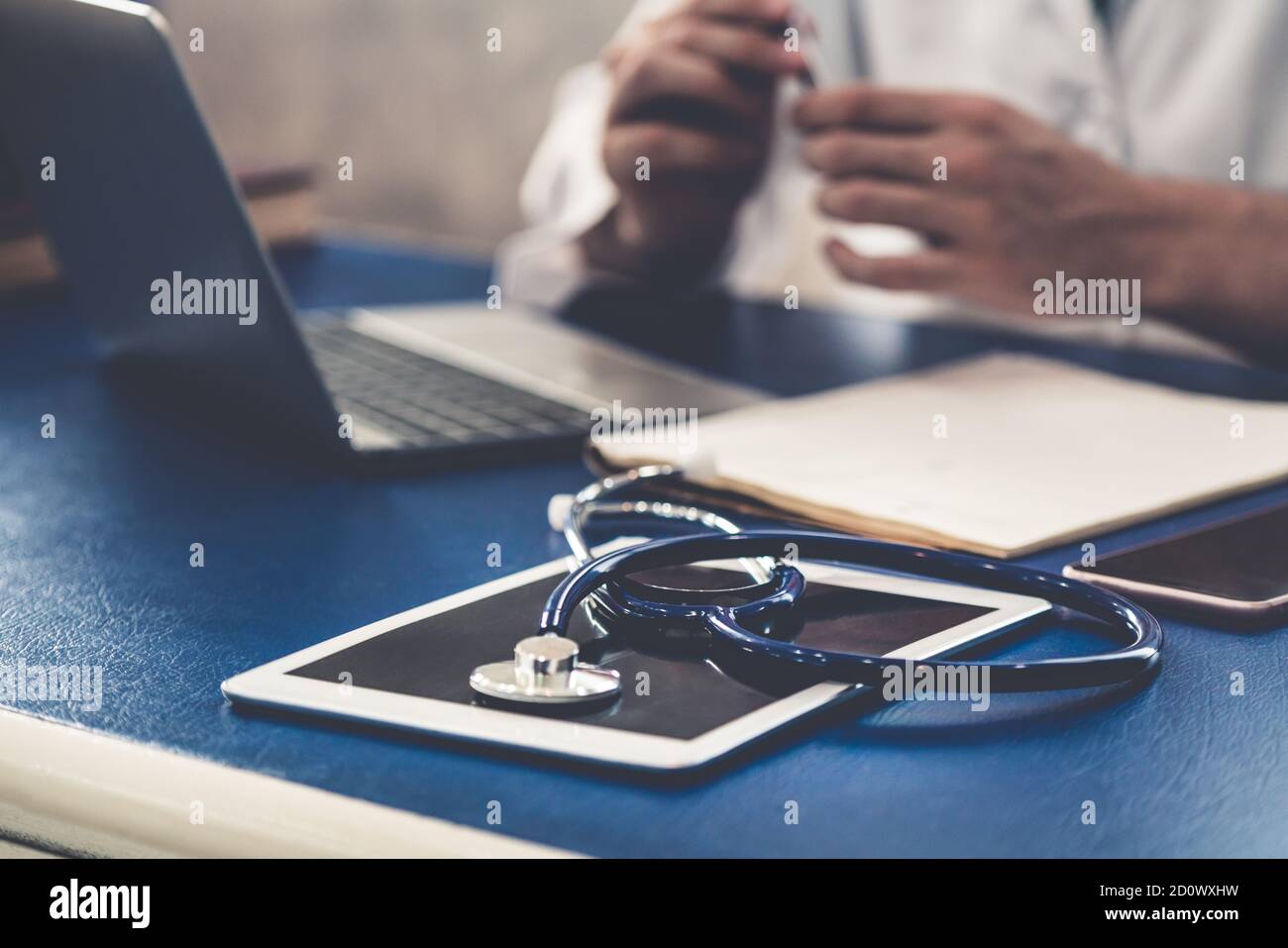 Doctor working in hospital office. Medical healthcare concept Stock ...