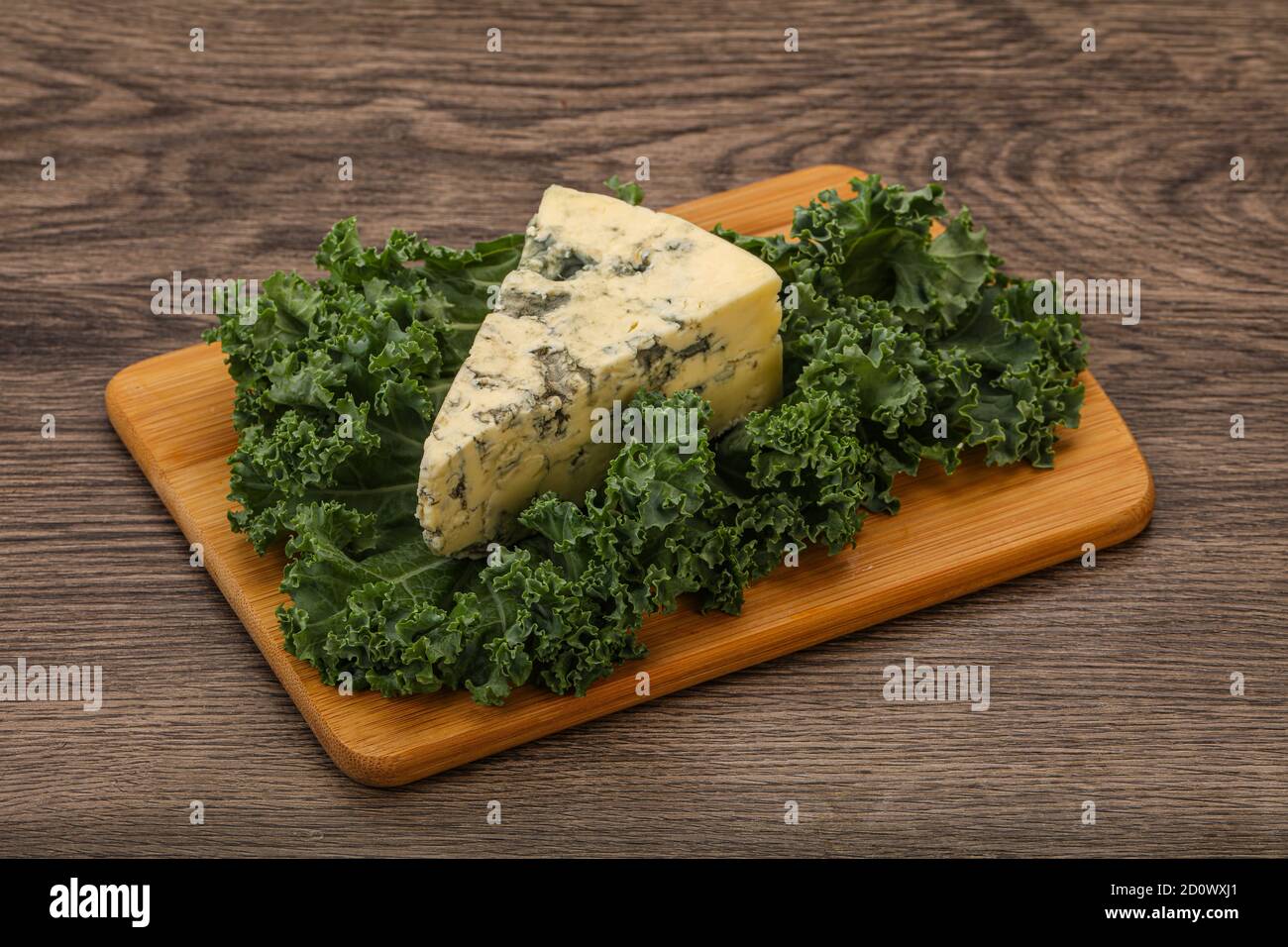 Dairy Blue cheese triangle with mold Stock Photo - Alamy