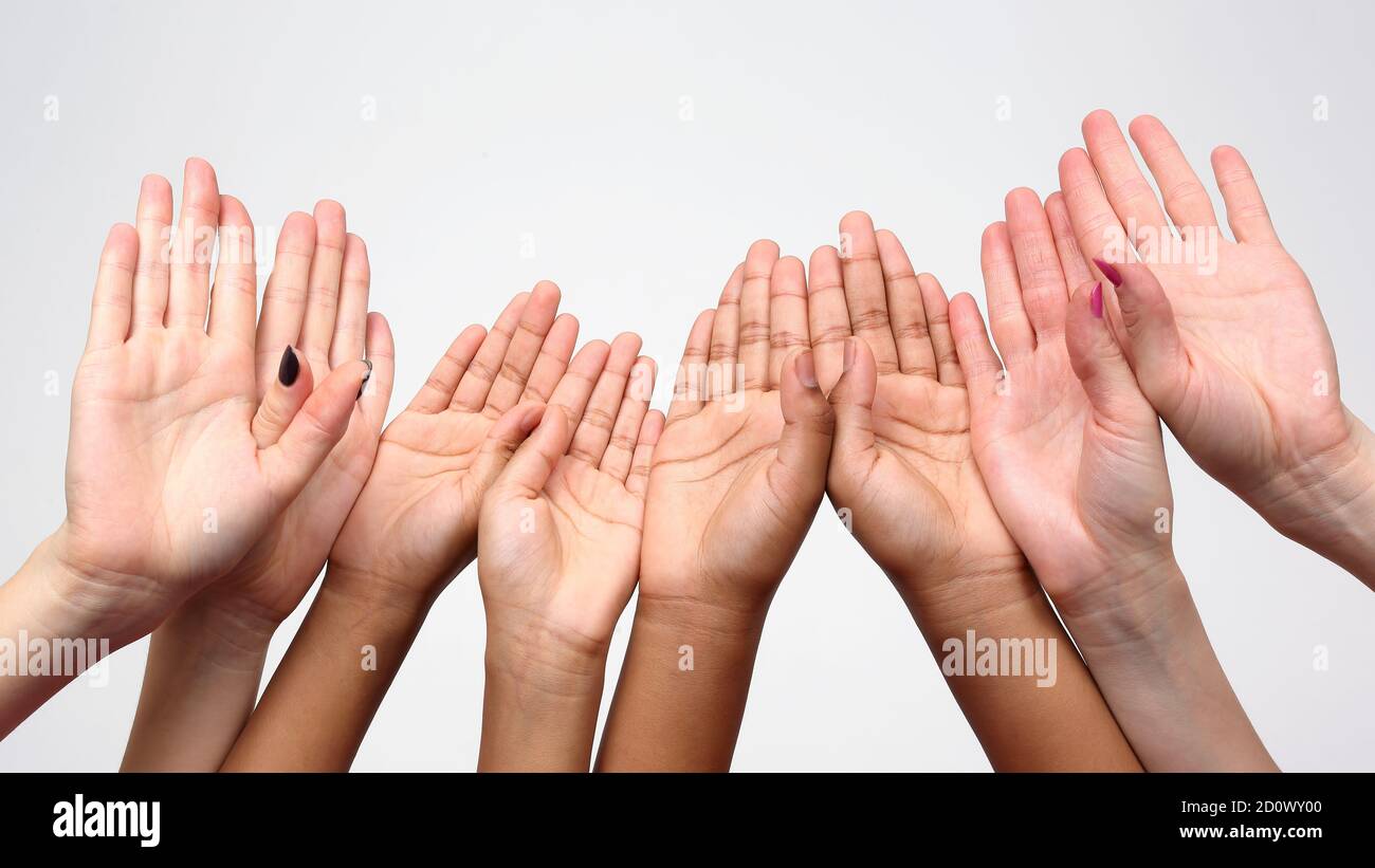 Hands kids up multiracial hi-res stock photography and images - Alamy