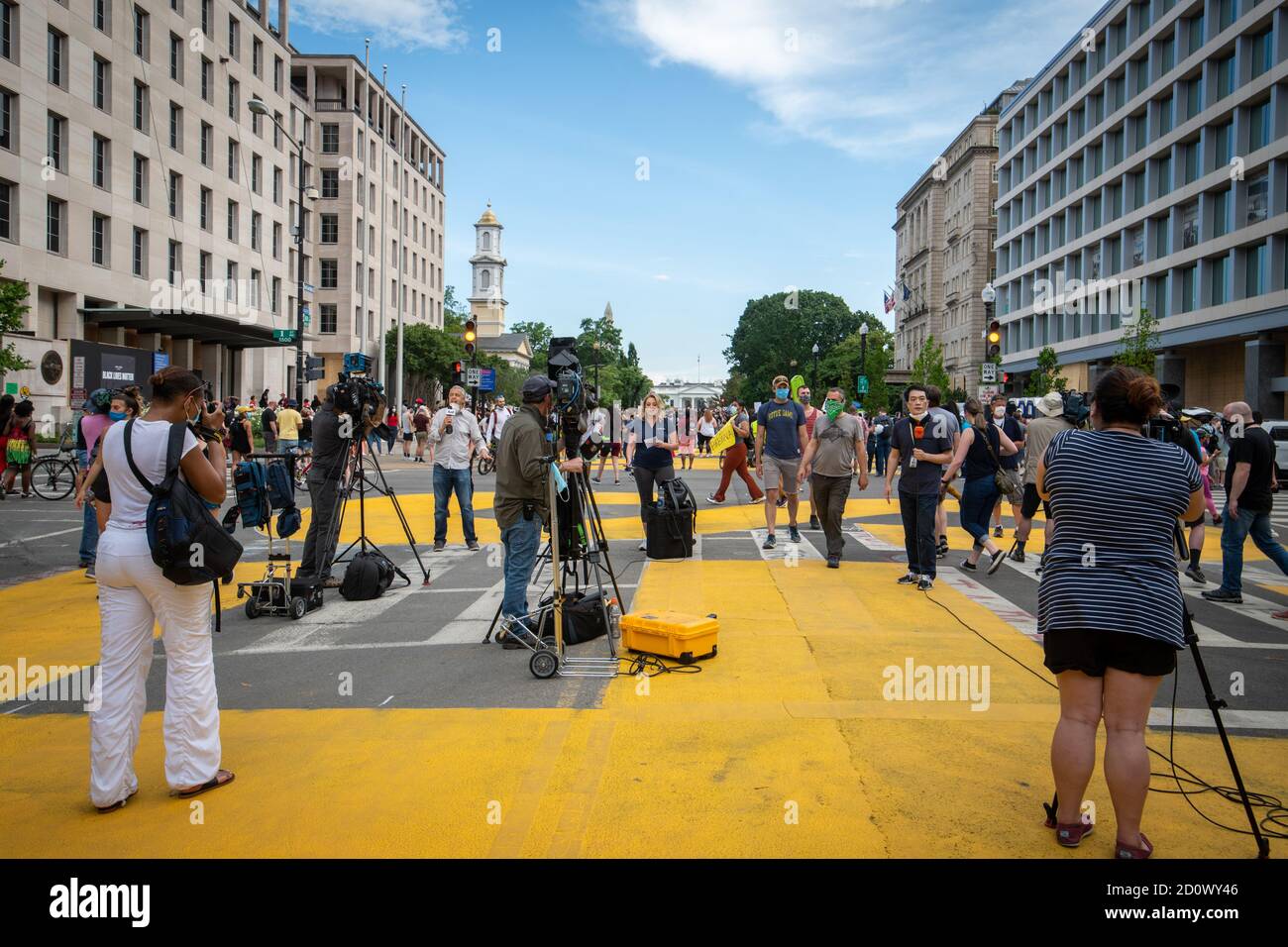 News Reporters Filming a Black Lives Matter protest on street painting ...