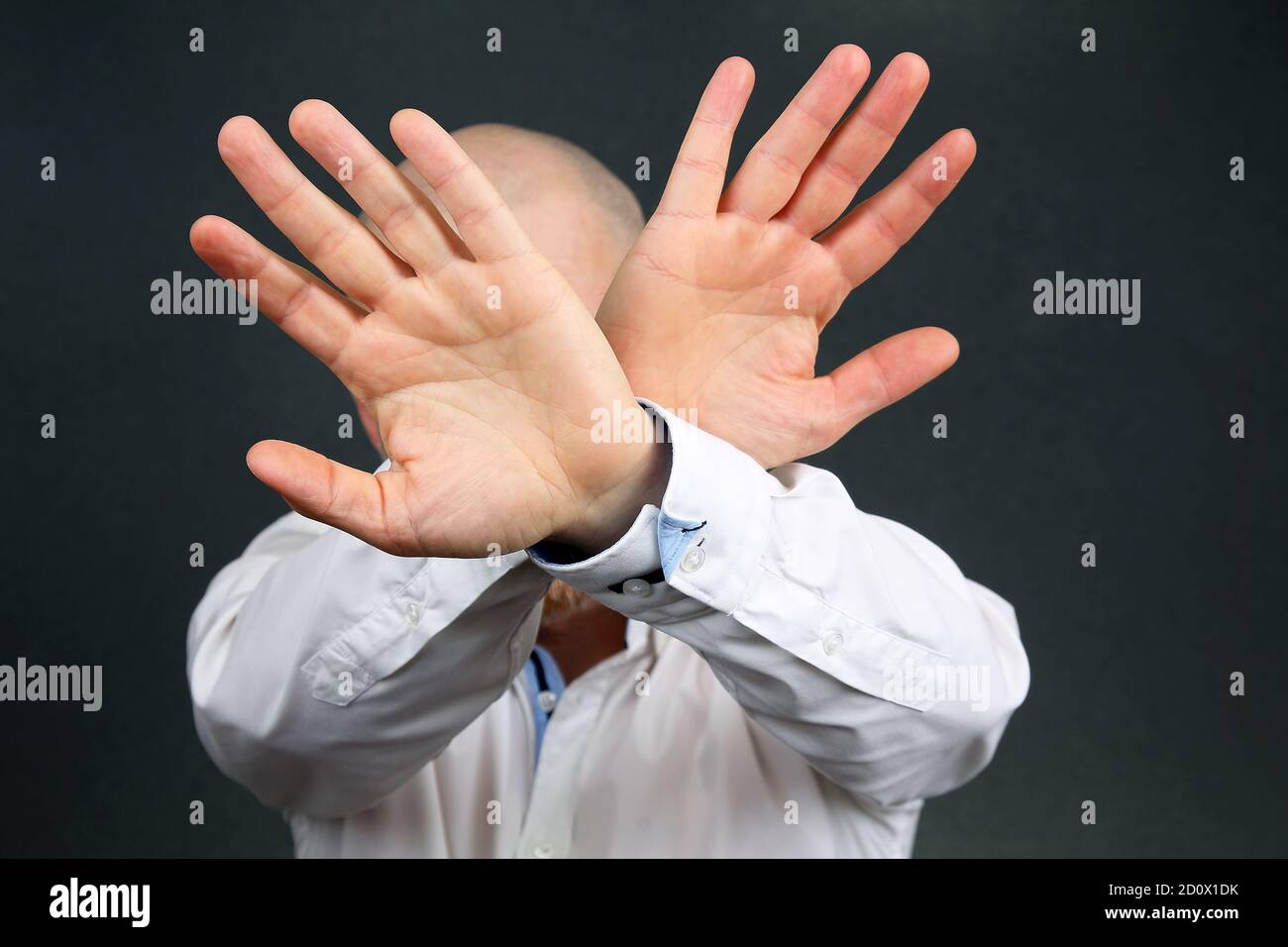 the negative gesture of men turned aside Stock Photo - Alamy
