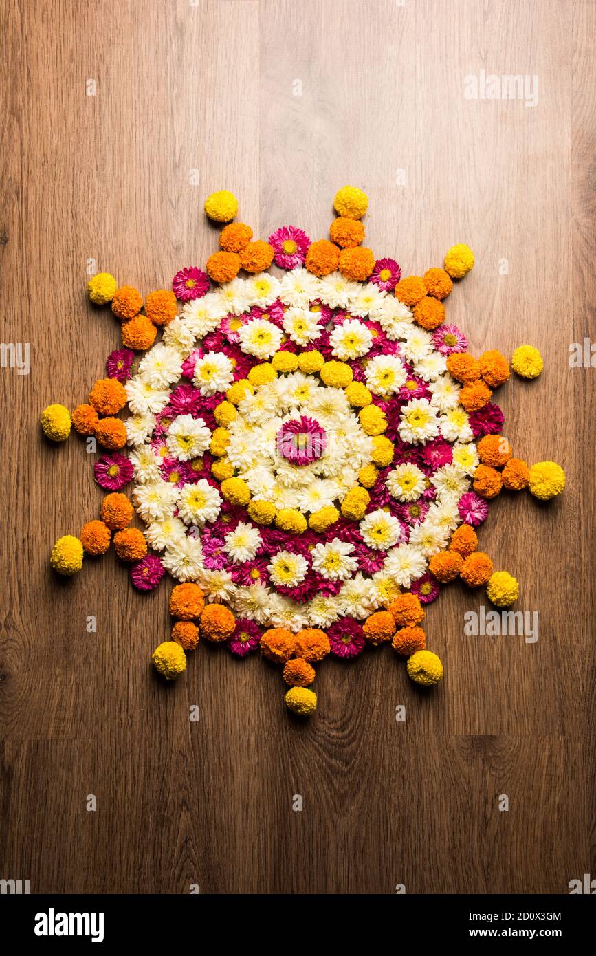 Flower Rangoli for Diwali or Pongal Festival made using Marigold or ...