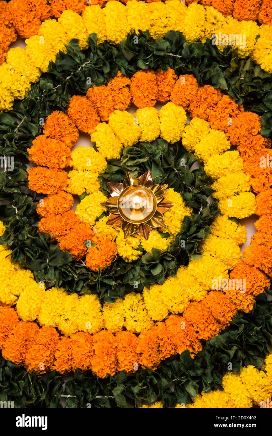 Flower Rangoli for Diwali or Pongal Festival made using Marigold or ...