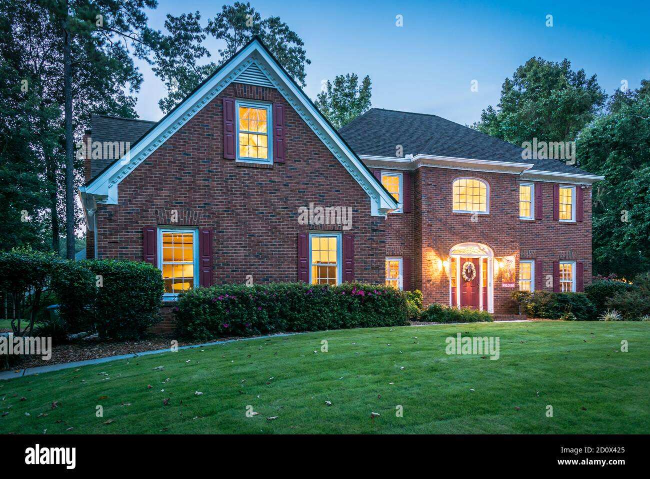Upscale brick home at twilight in Metro Atlanta, Georgia. (USA Stock ...
