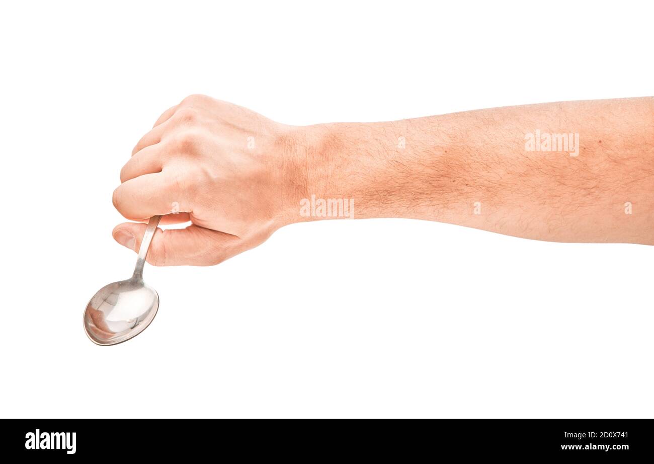 hand holding spoon isolated on white background Stock Photo - Alamy