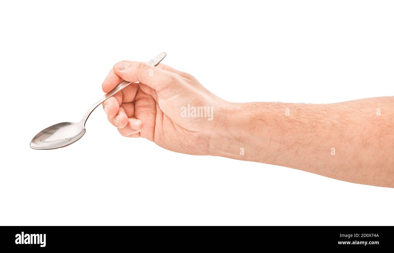 hand holding spoon isolated on white background Stock Photo - Alamy