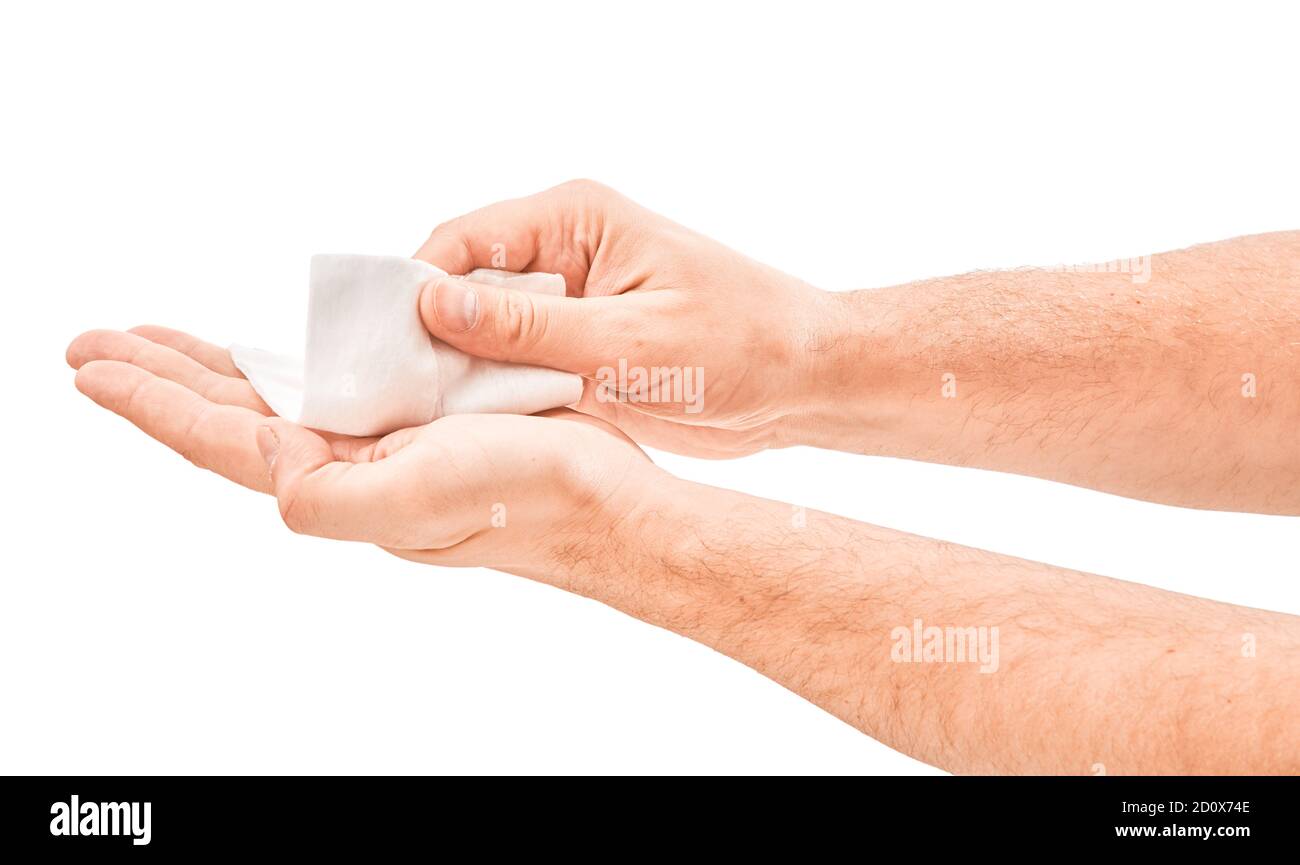 Man cleaning his hand with wet tissue isolated on white background ...