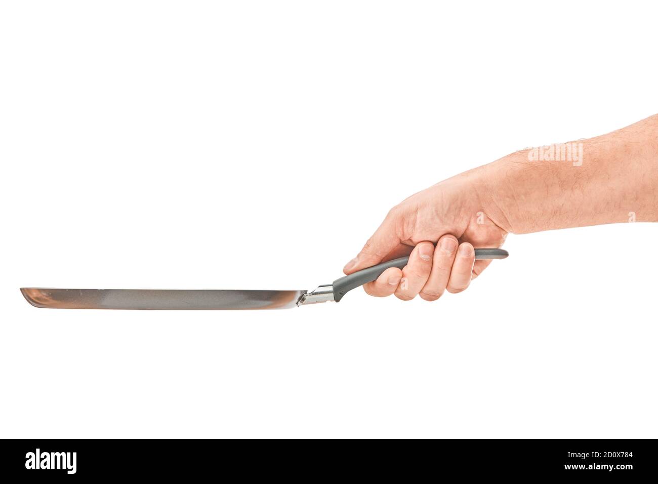 Hand holding a black frying pan isolated on white background Stock ...