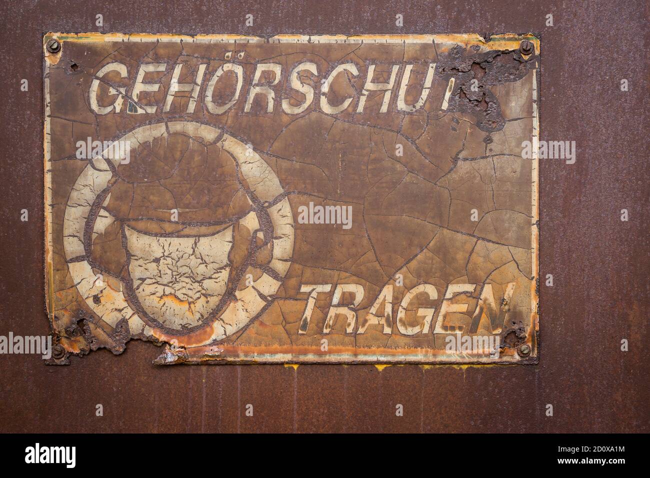 old german sign to wear ear protection Stock Photo - Alamy