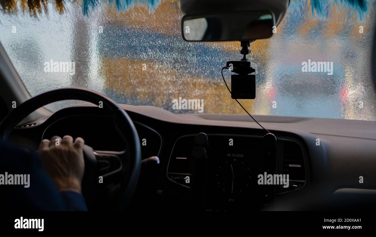 automatic car wash viewed from inside the car. Car sanitization concept ...