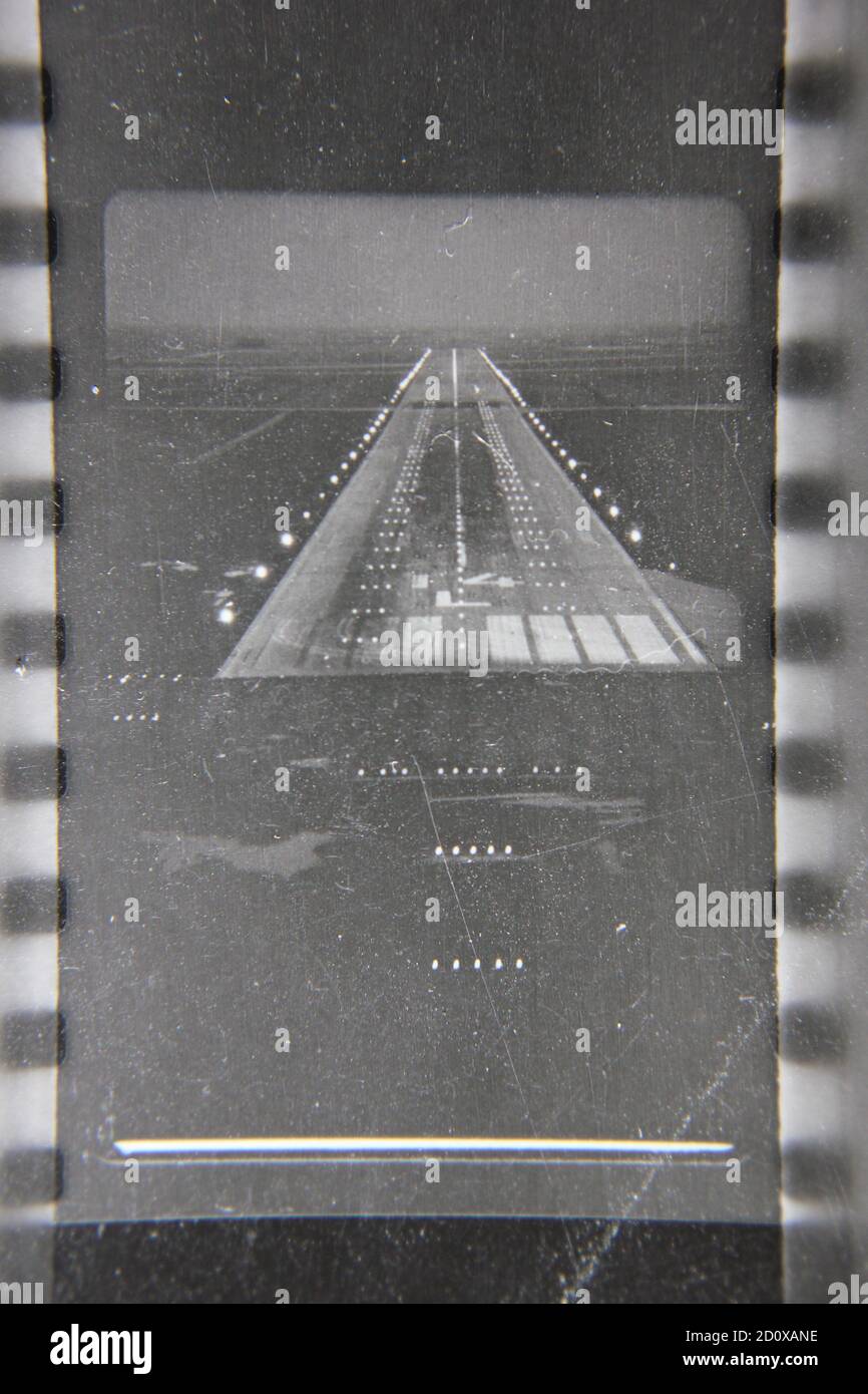 Fine 1970s vintage black and white photography of an airport runway approach lit at night Stock ...