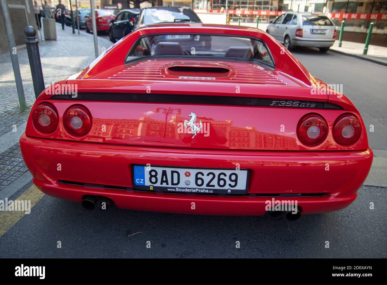 Red parked Ferrari F355 gts convertible in the famous red ferarri color ...