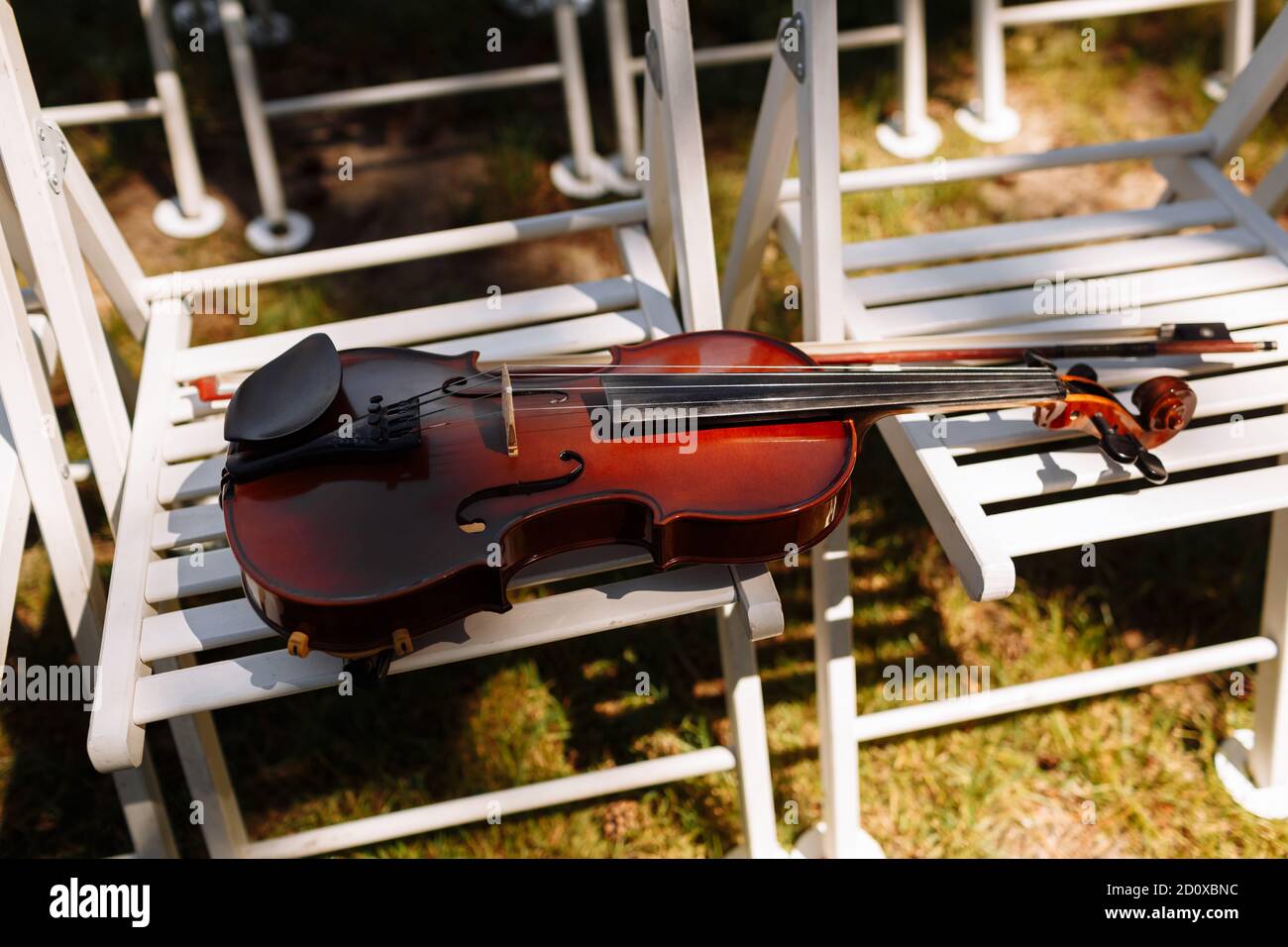 Violin on chair hi-res stock photography and images - Alamy
