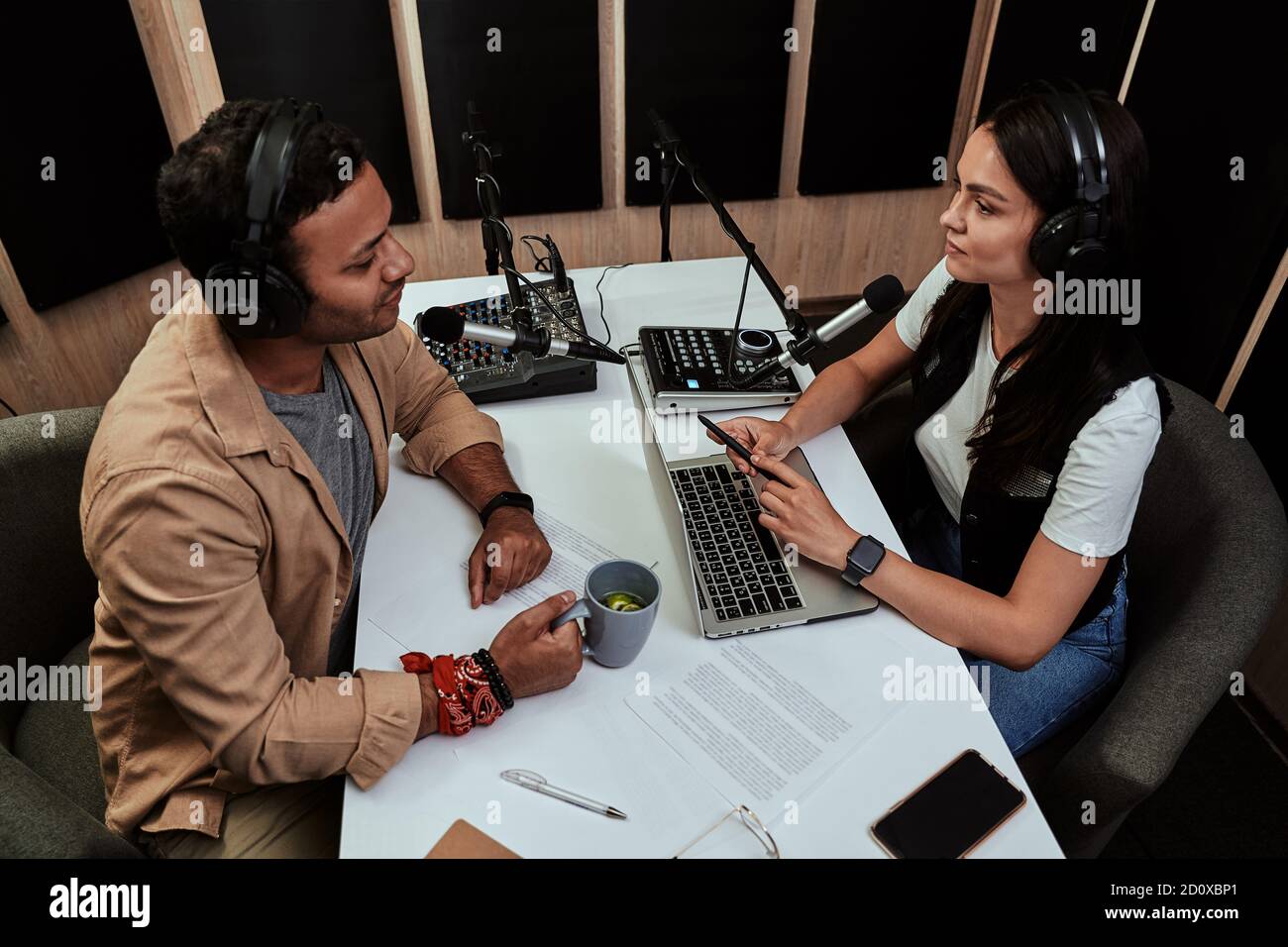Male female radio hosts discussing hi-res stock photography and images ...