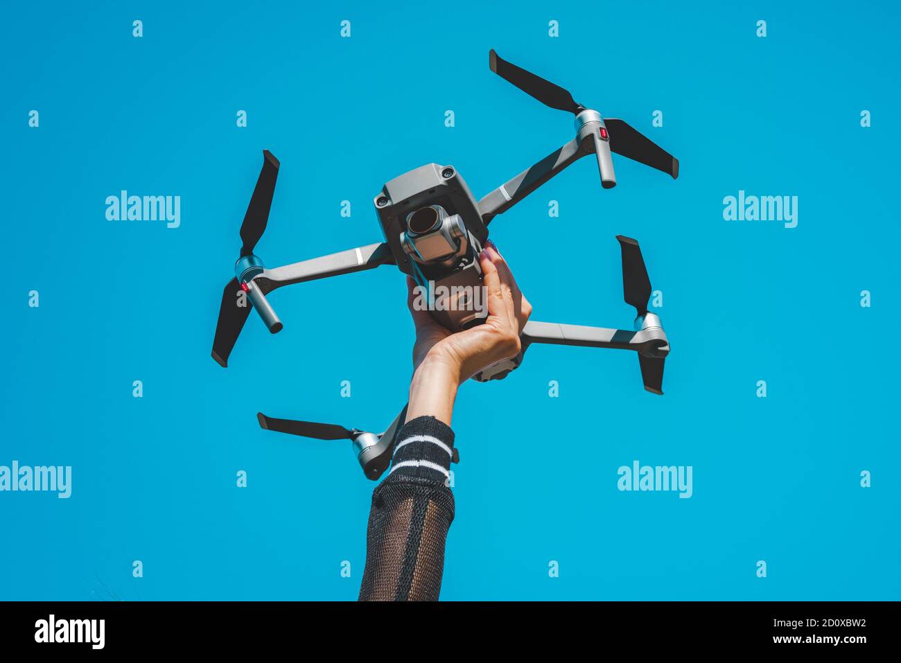 Hand holding sky remote control hi-res stock photography and images - Alamy