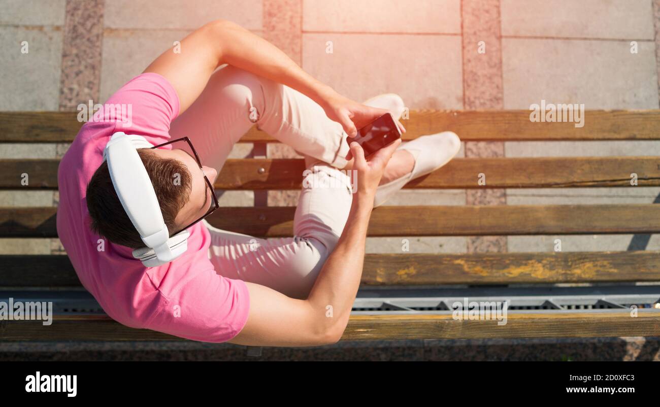 Handsome guy on bench Stock Photo - Alamy