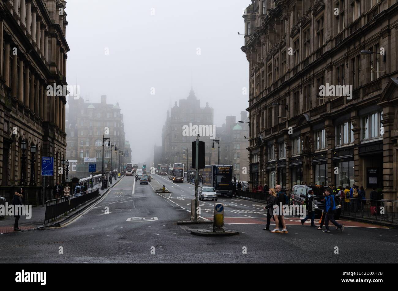 Street view of North Bridge on a foggy day, Edinburgh, Scotland Stock ...