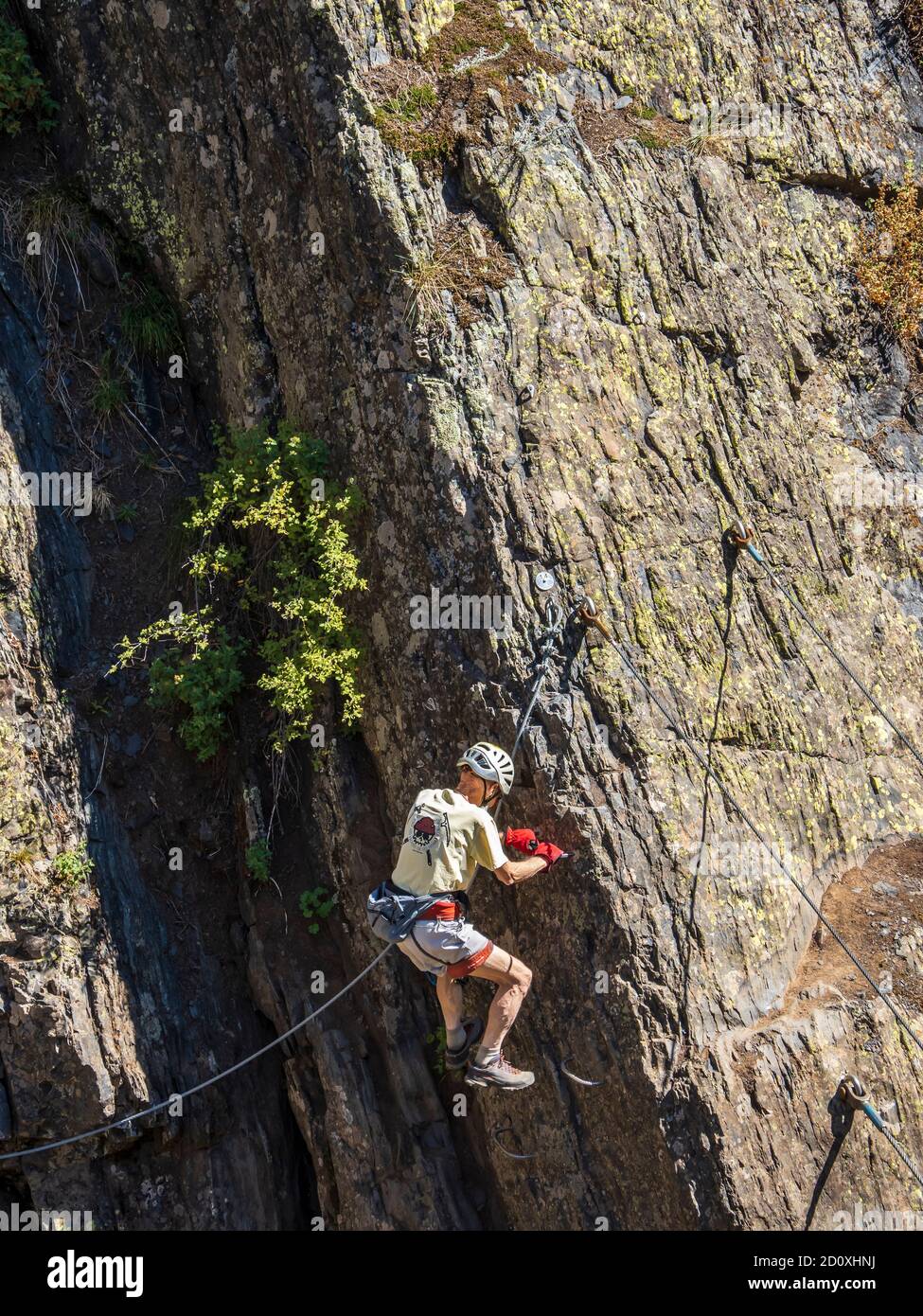 Man, aged 80+, climbs on the Ouray Via Ferrata, Ouray, Colorado Stock ...