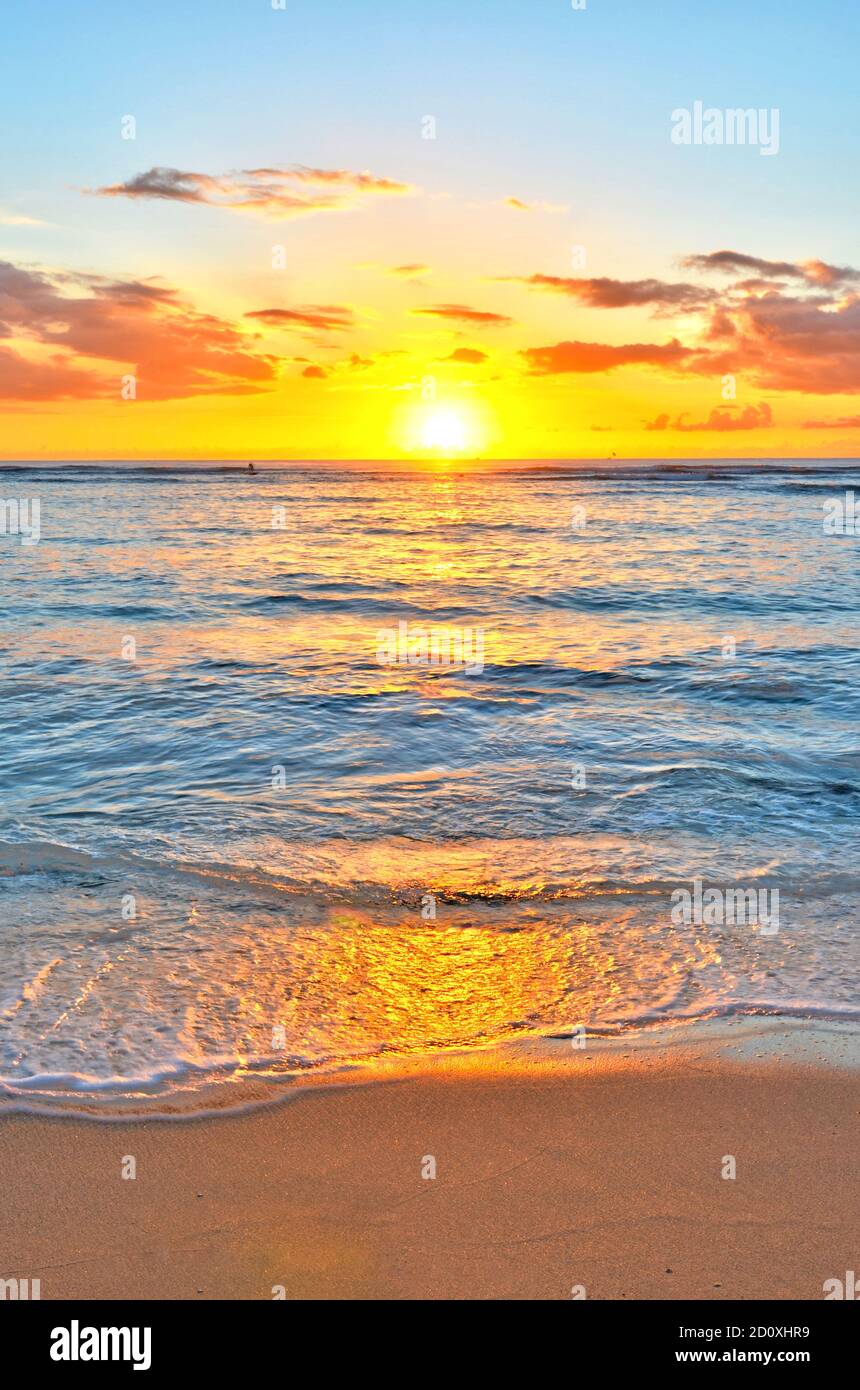 Sunset at Waikiki beach in Honolulu on Oahu, Hawaii Stock Photo - Alamy