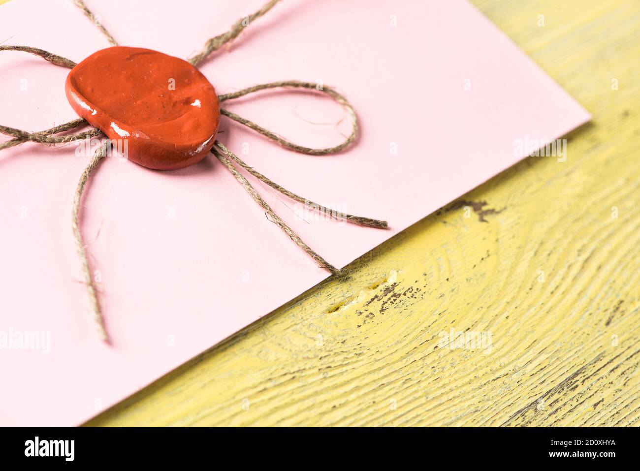 Letter with seal on table Stock Photo - Alamy