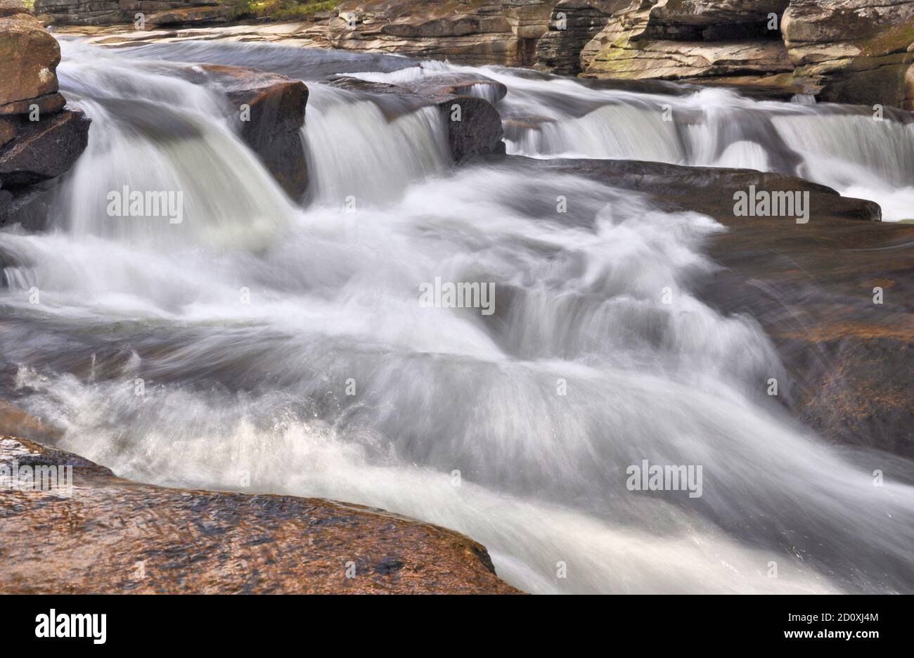 Scenic gorge and waterfall (lower falls) where Ammonoosuc River plunges ...