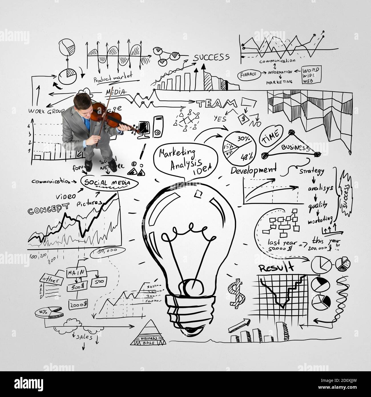 Businessman play success melody Stock Photo - Alamy