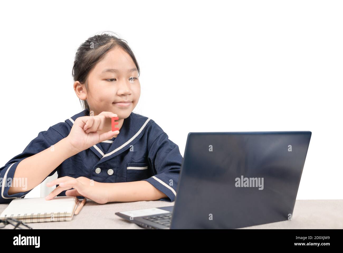 schoolgirl learn english online at home isolated on white background ...