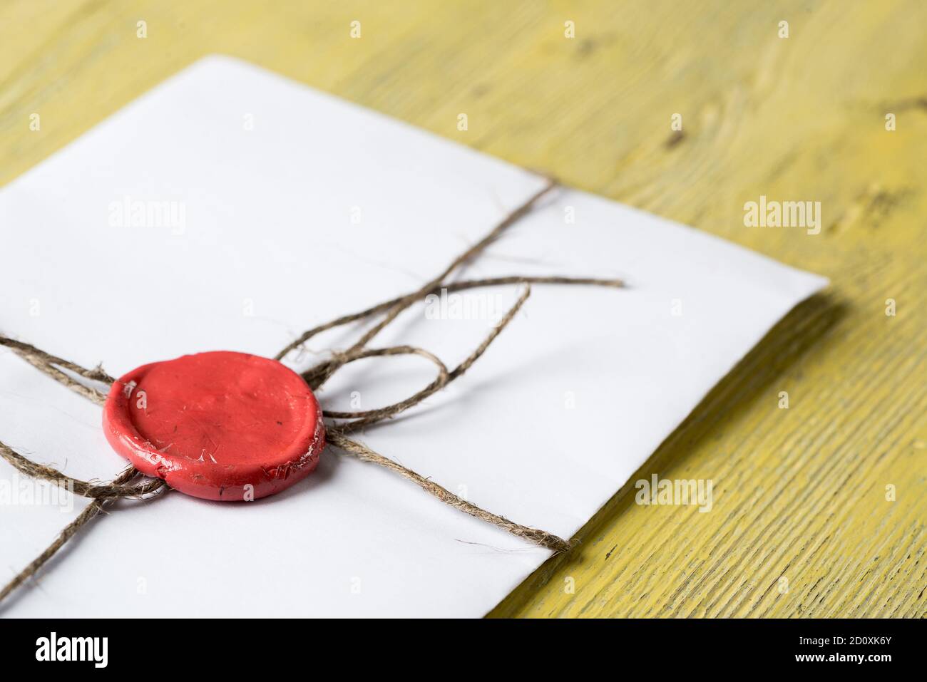 Letter with seal on table Stock Photo - Alamy
