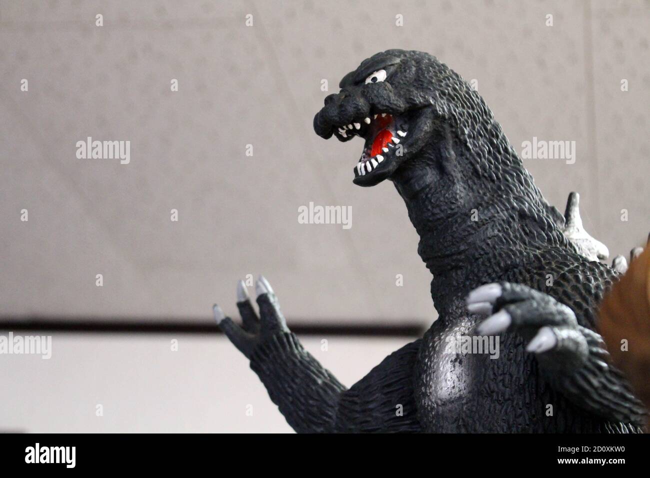 Action figure Godzilla screaming, Japanese toy Stock Photo - Alamy