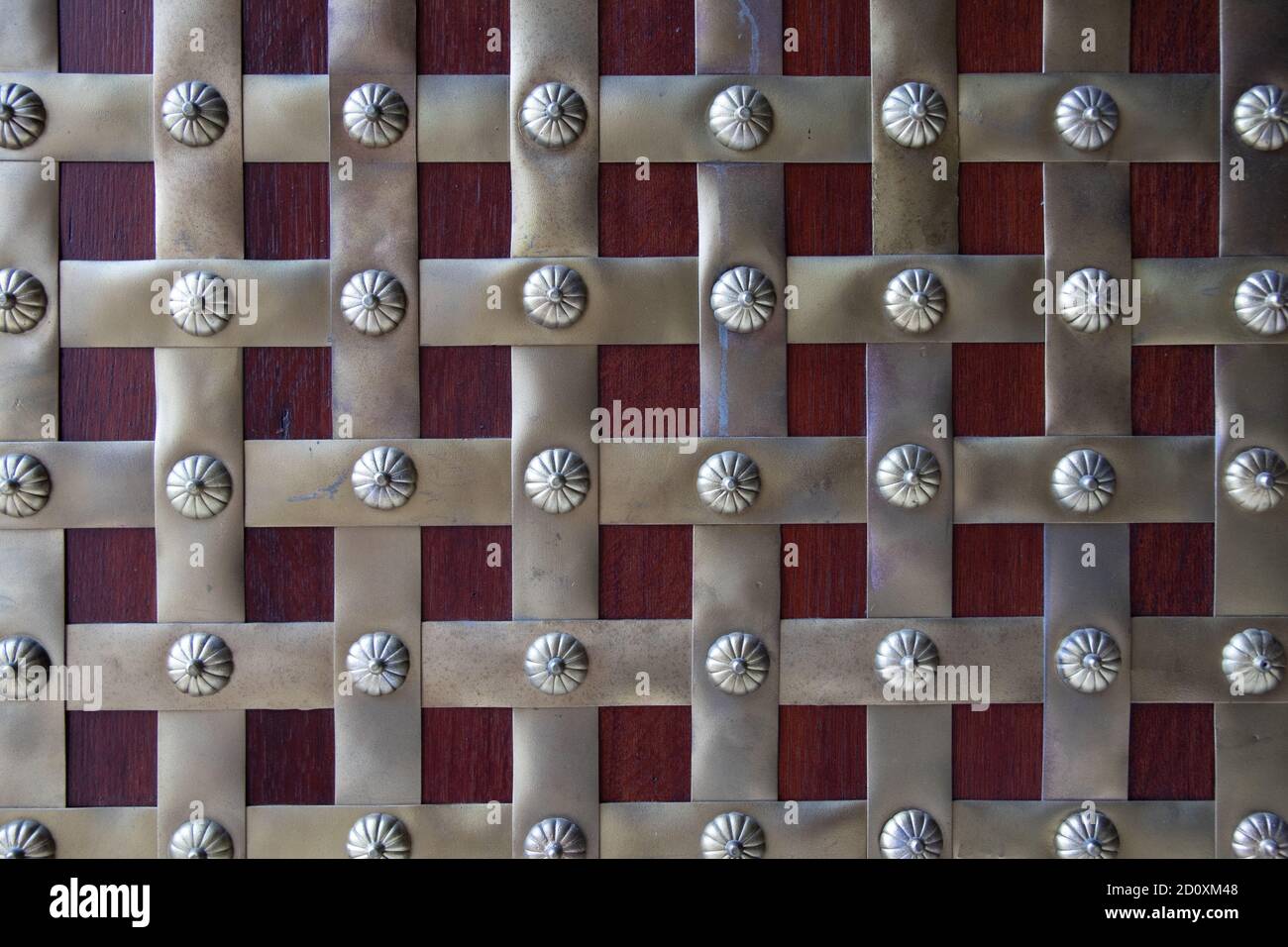 Closeup of metal grill bars and round rivets of ancient structure Stock ...